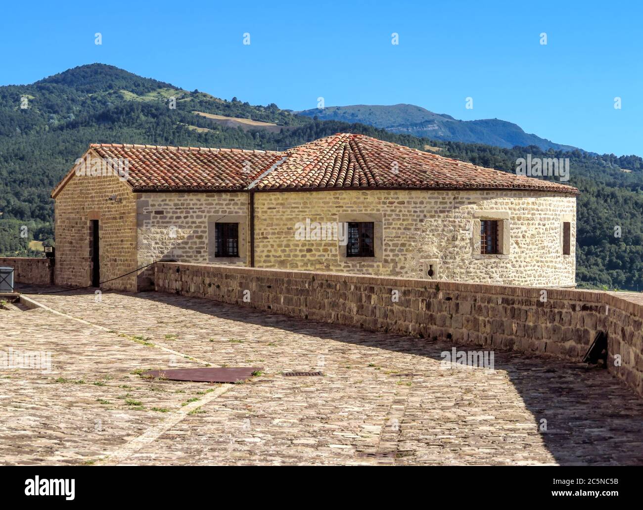 The Renaissance Fortress of San Leo, located on a rocky cliff Stock ...