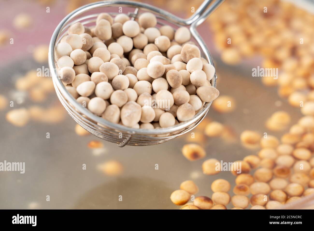 Cooking, boiling brown sugar flavor tapioca pearl balls, ingredient of ...