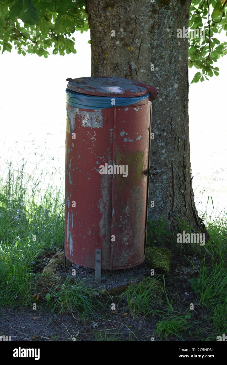 trash can in the forest Stock Photo - Alamy