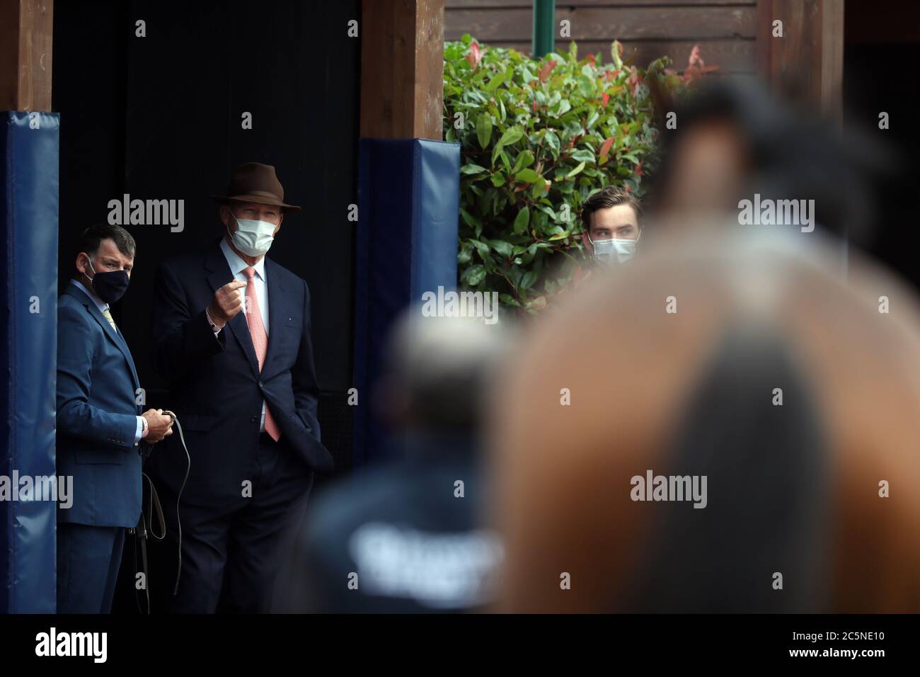 Horse Trainer John Gosden (second left) at Epsom Racecourse Stock Photo ...
