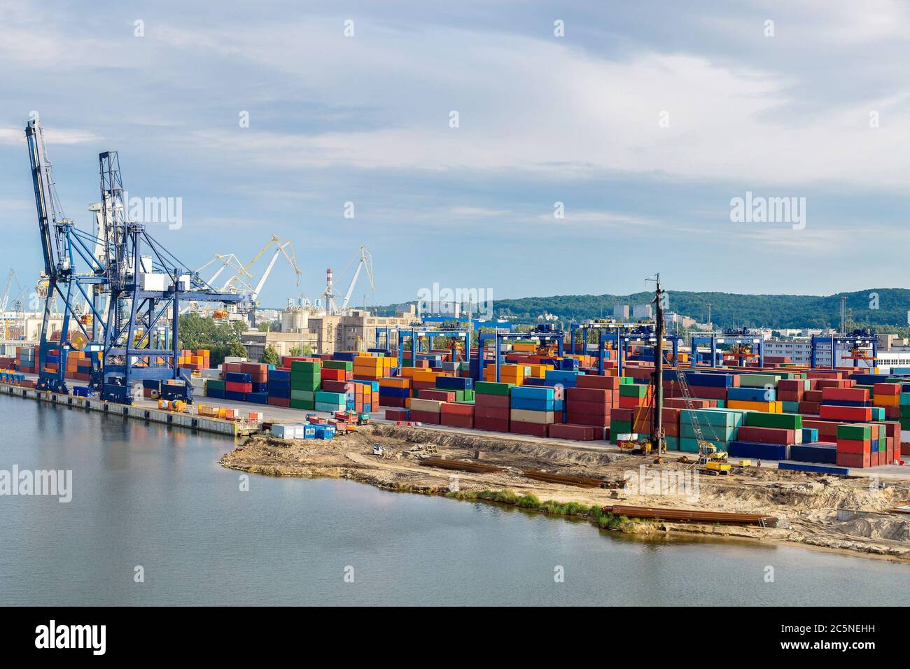 Container terminal in Gdansk during loading in a summer day, Poland ...