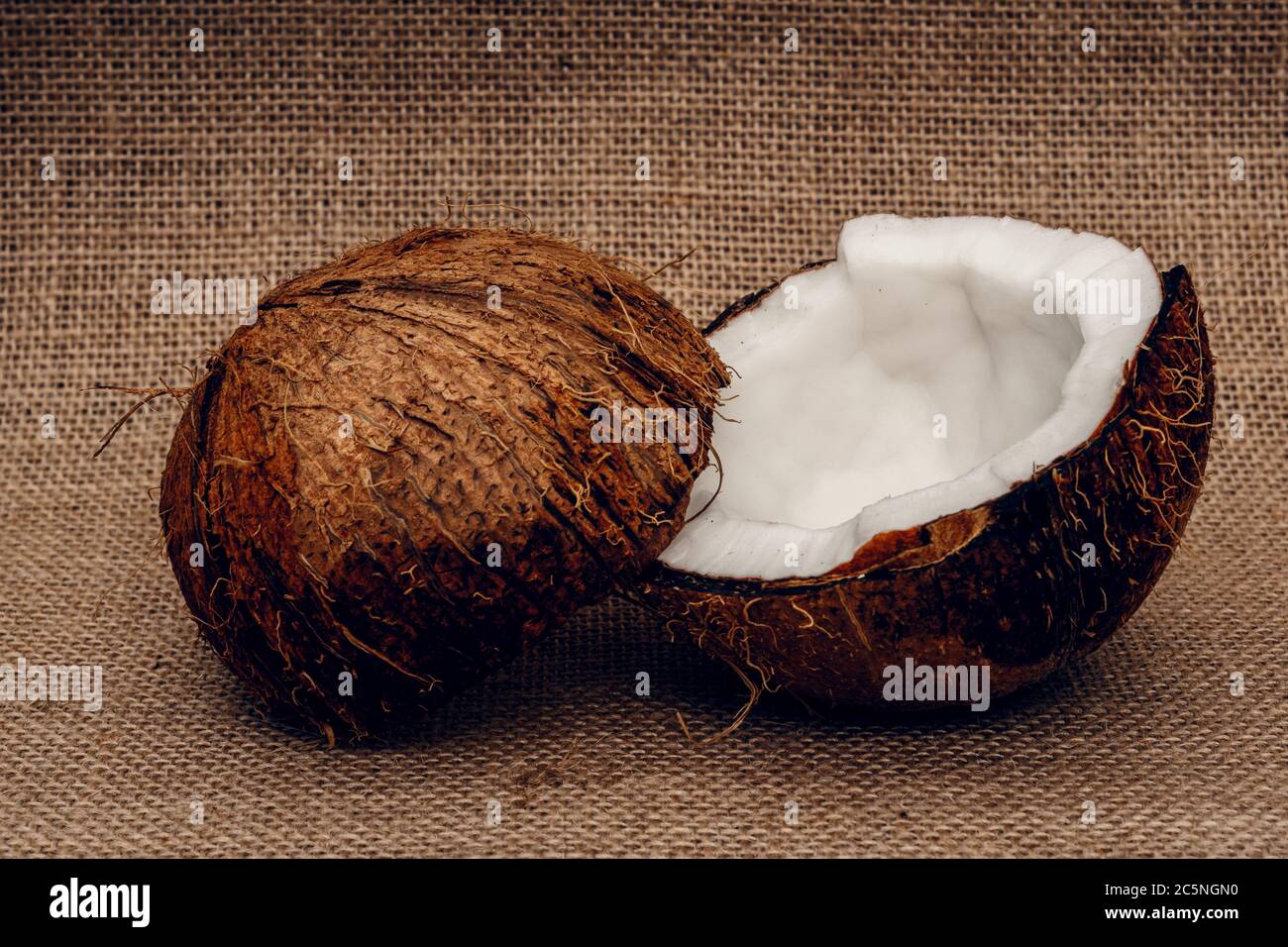 Parts of coconut on a colored background. Close up. Fresh ripe coconut ...