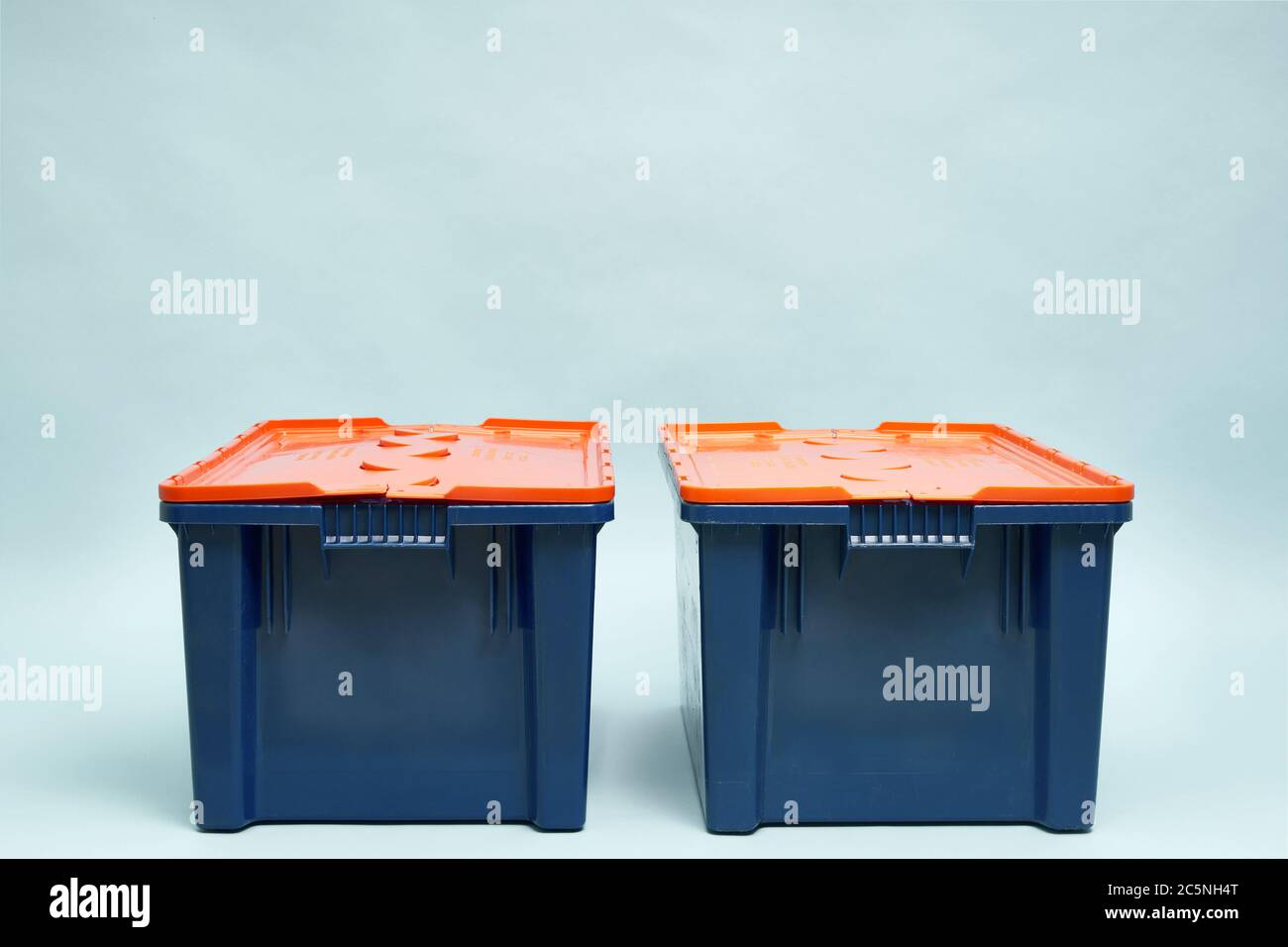 Plastic storage boxes. Boxes for the delivery of products. Orderly ...