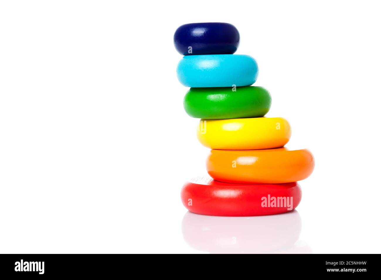 A big pyramid build from colored wooden rings of color lgbt flag ...