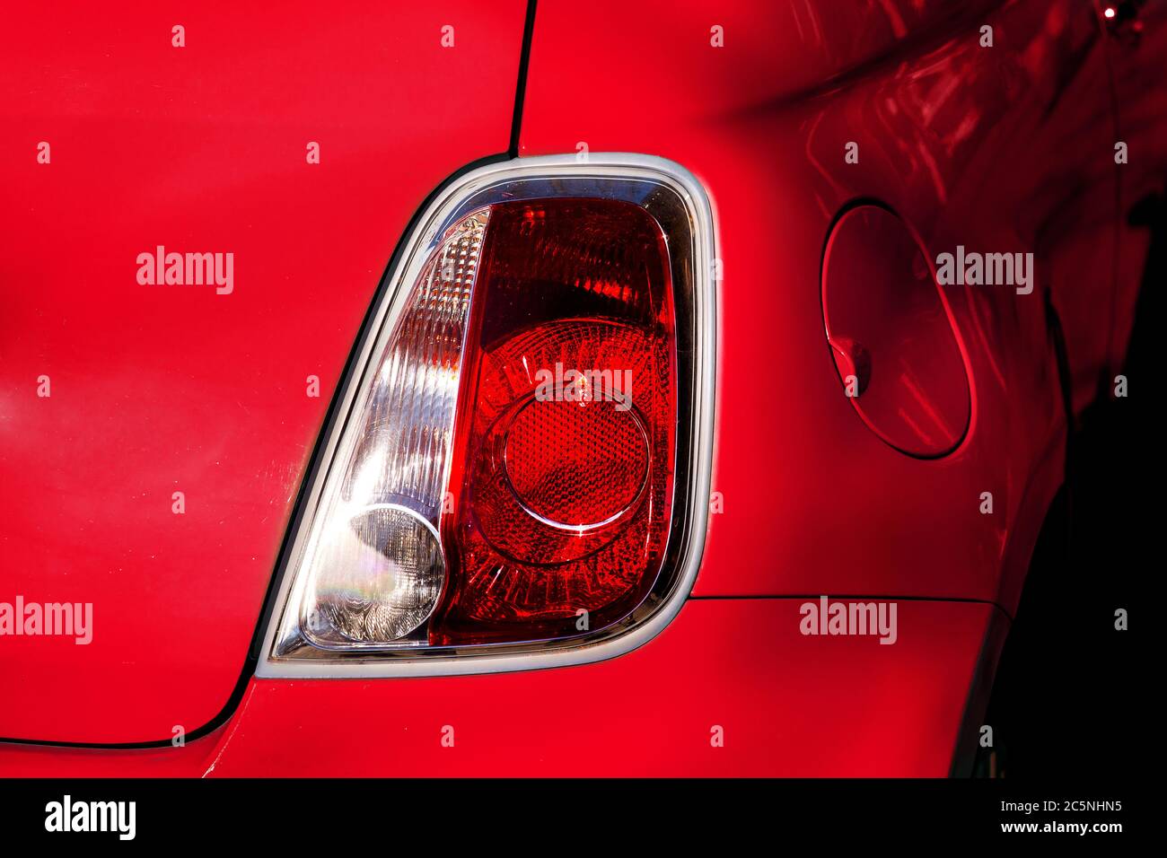 Taillight brake light of a classic retro car in blue closeup of the ...