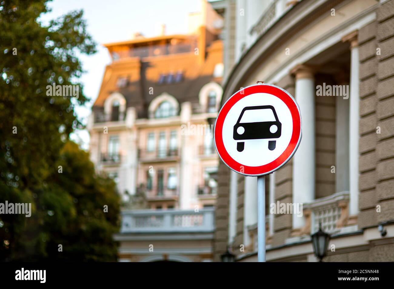 A car sign prohibiting the passage of passenger cars, a round sign with ...