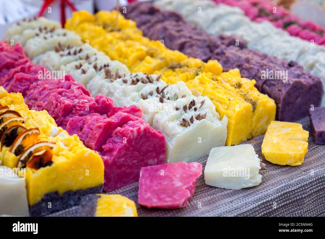 Handmade soap laid out on the counter of the store and cut into pieces ...