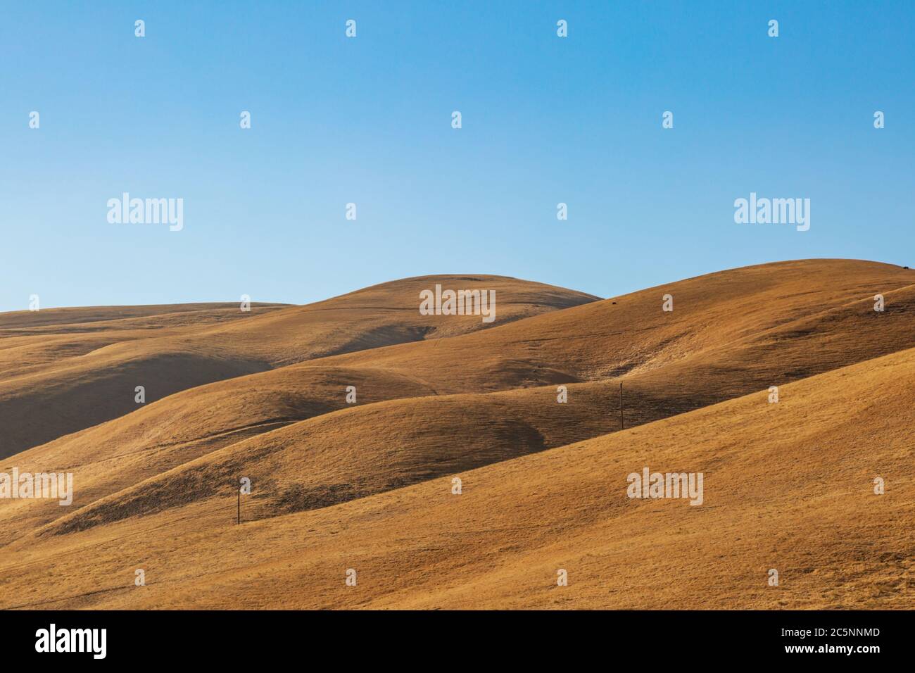 An early morning landscape of dry hills in California, during a drought ...