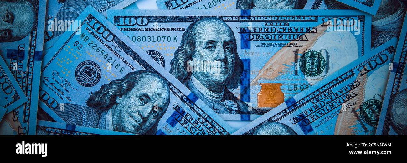 The background of a one hundred dollar bill. Style blue light Stock ...