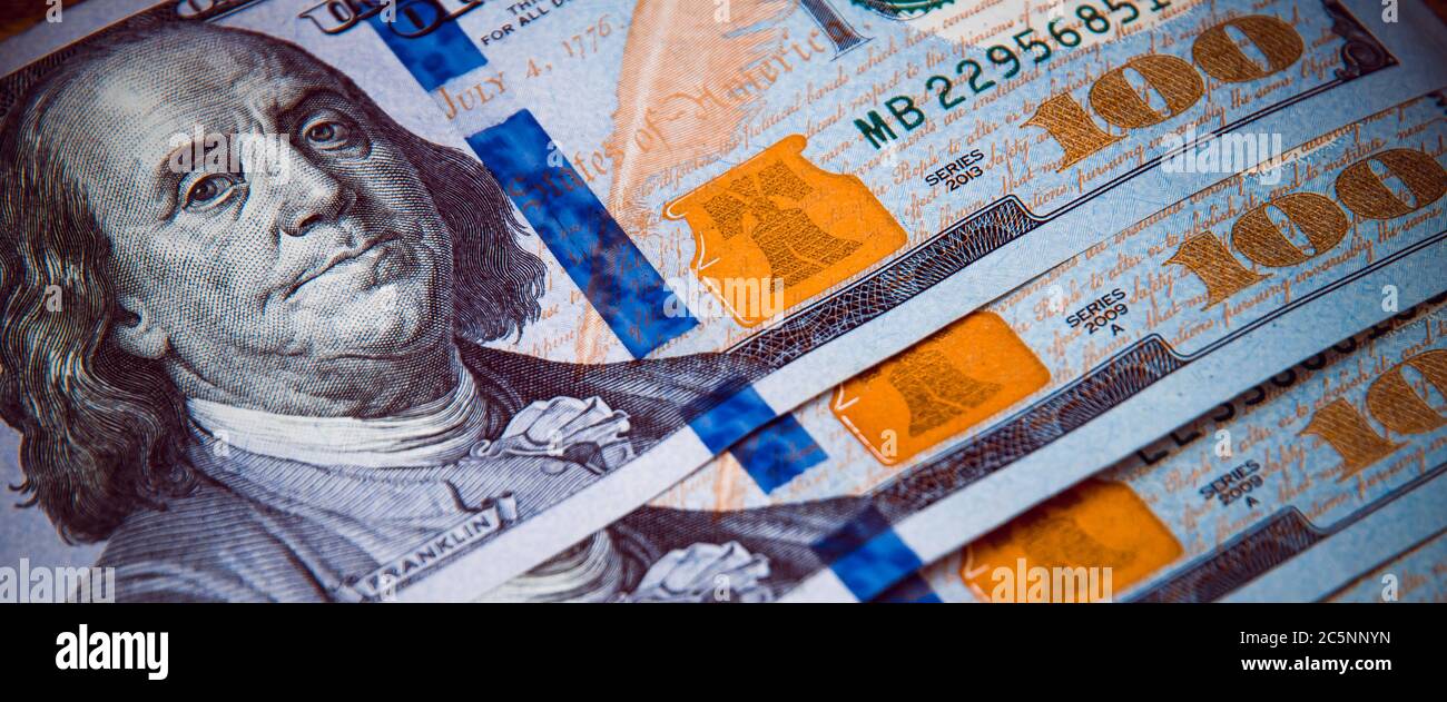 The background of a one hundred dollar bill. Style blue light Stock ...