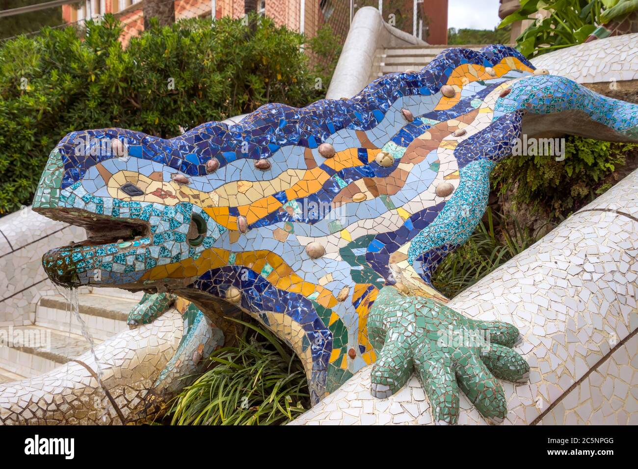 BARCELONA, SPAIN - JULY 3, 2016: Lizard of Gaudi mosaic in park Guell ...
