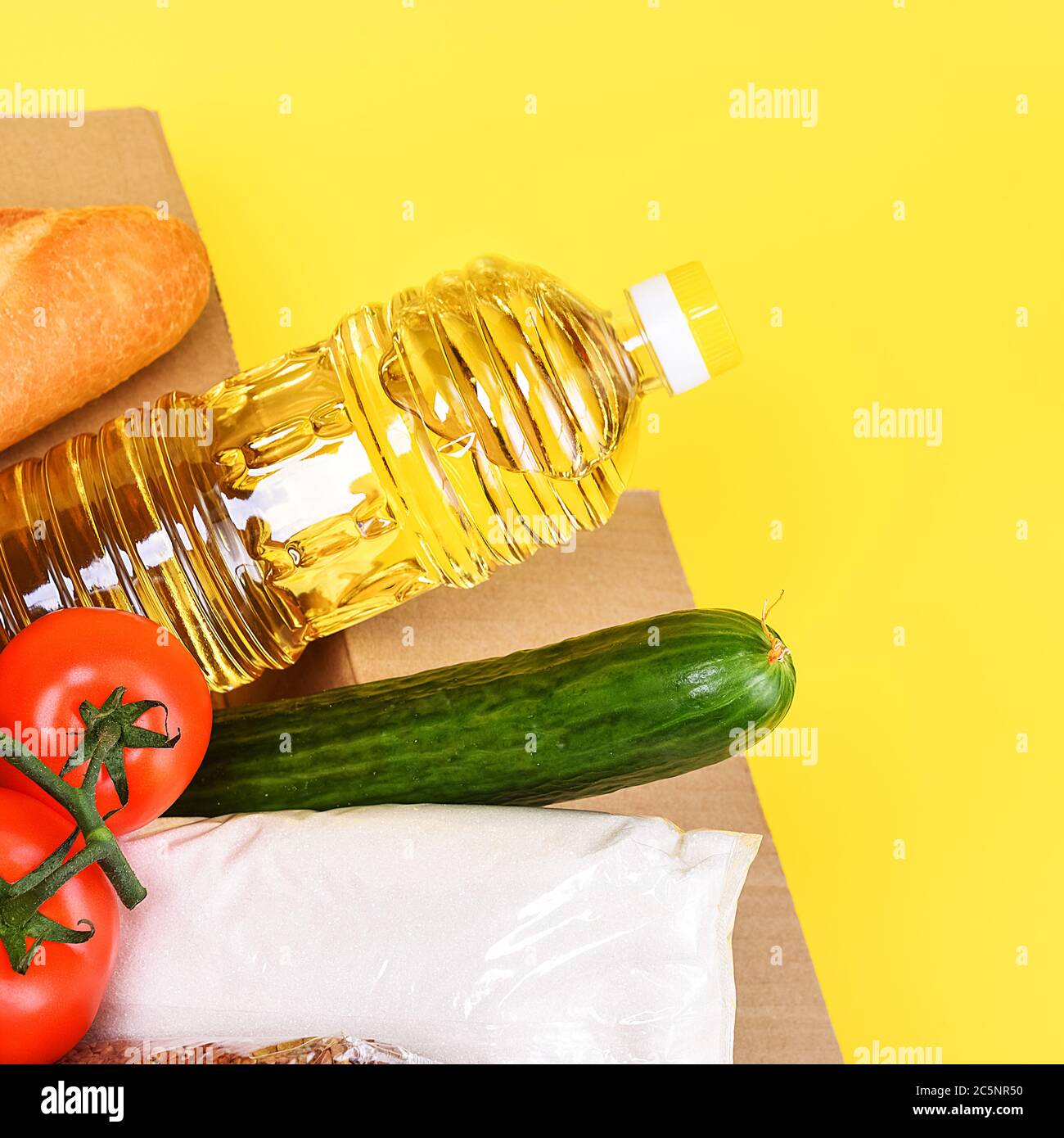 Cardboard box with food supplies for the period of quarantine isolation ...