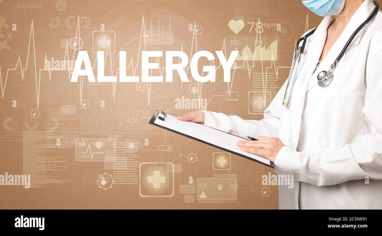 young doctor writing down notes with ALLERGY inscription, healthcare ...