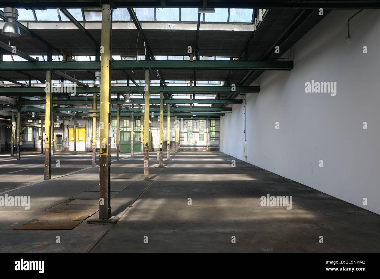 the interior of an abandoned industrial warehouse building on old ...