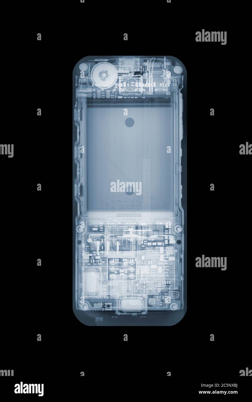 Mobile phone, coloured X-ray Stock Photo - Alamy