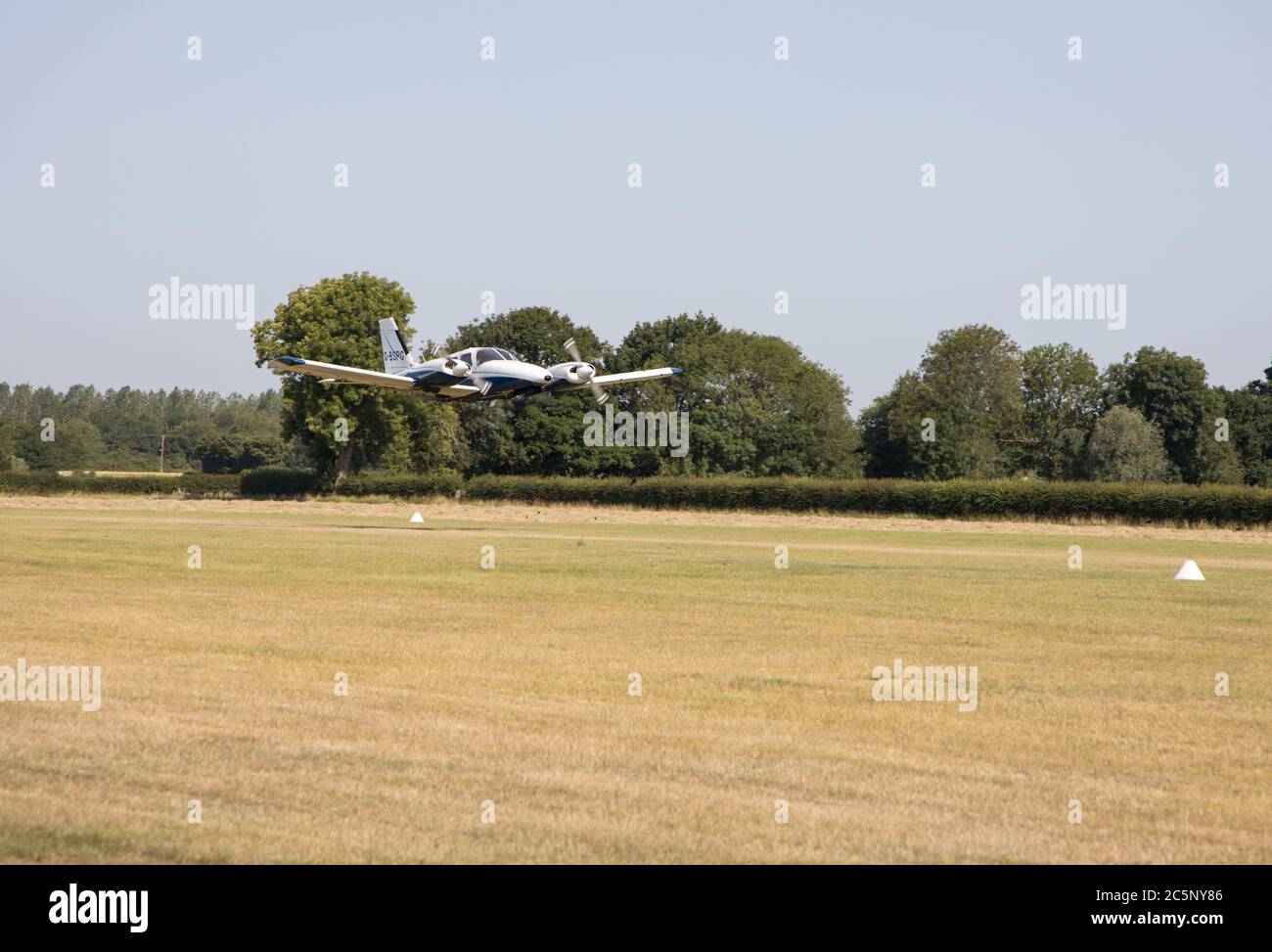 taking off at headcorn airfield kent Stock Photo - Alamy