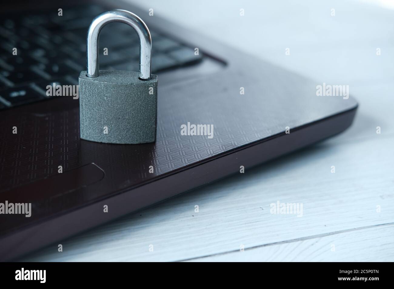 internet safety concept with padlocked on laptop computer keyboard ...