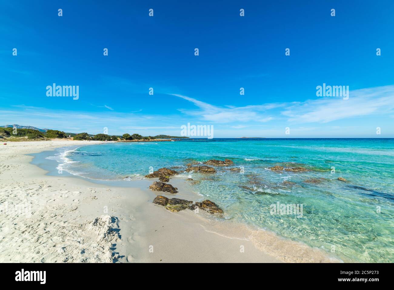 Turquoise water in Rena Bianca shore in Costa Smeralda. Sardinia, Italy ...