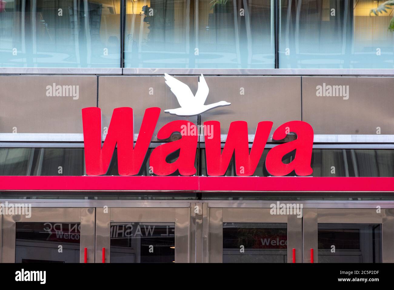 Washington, D.C. / USA - July 03 2020: Sign on storefront entrance of ...