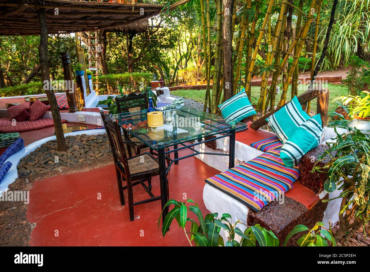 Typical cafe in India outdoors with traditional chairs and table (glass ...