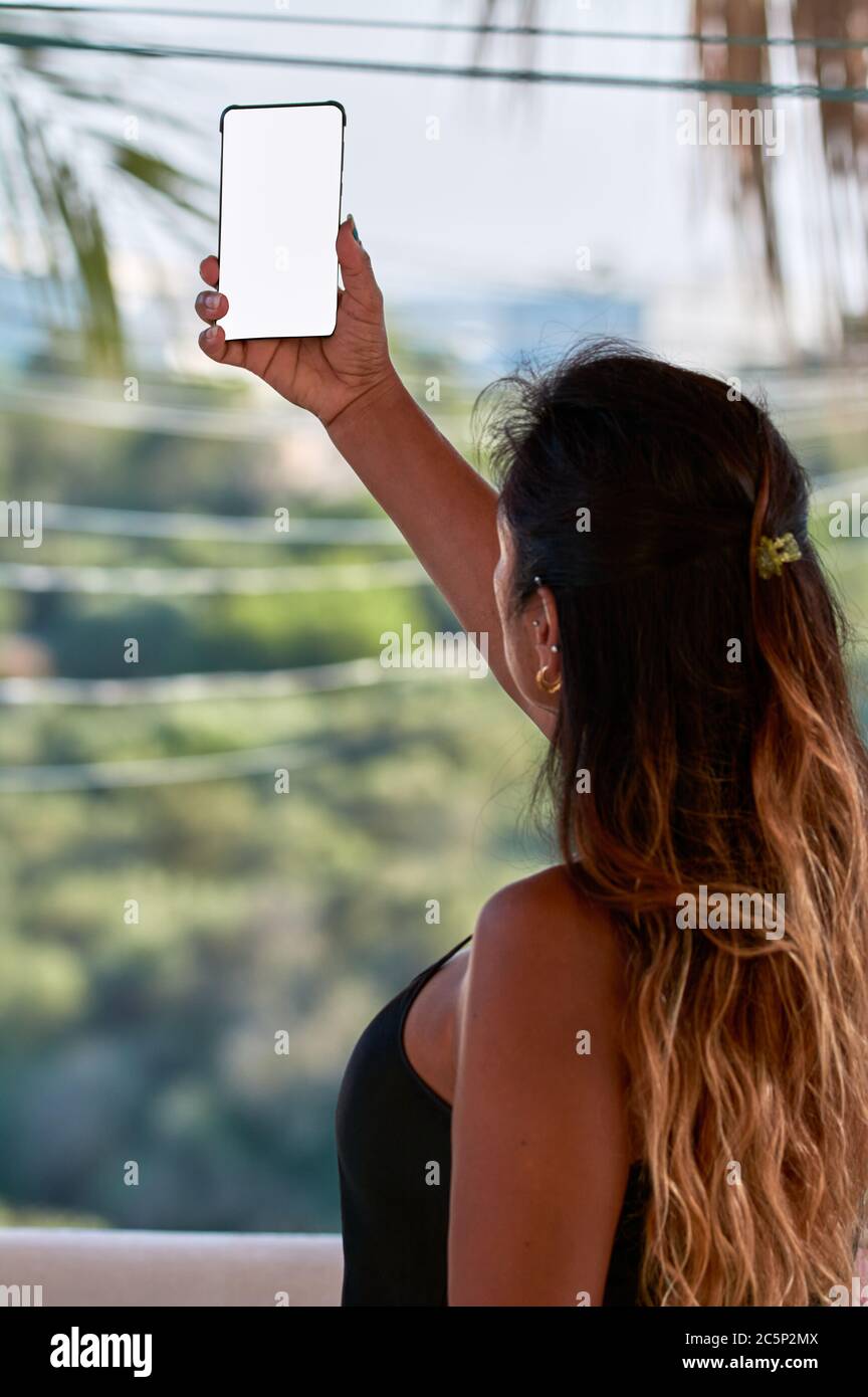 smartphone screen cutout, latin woman with using smartphone, augmented ... smartphone screen cutout, latin woman with using smartphone, augmented ...