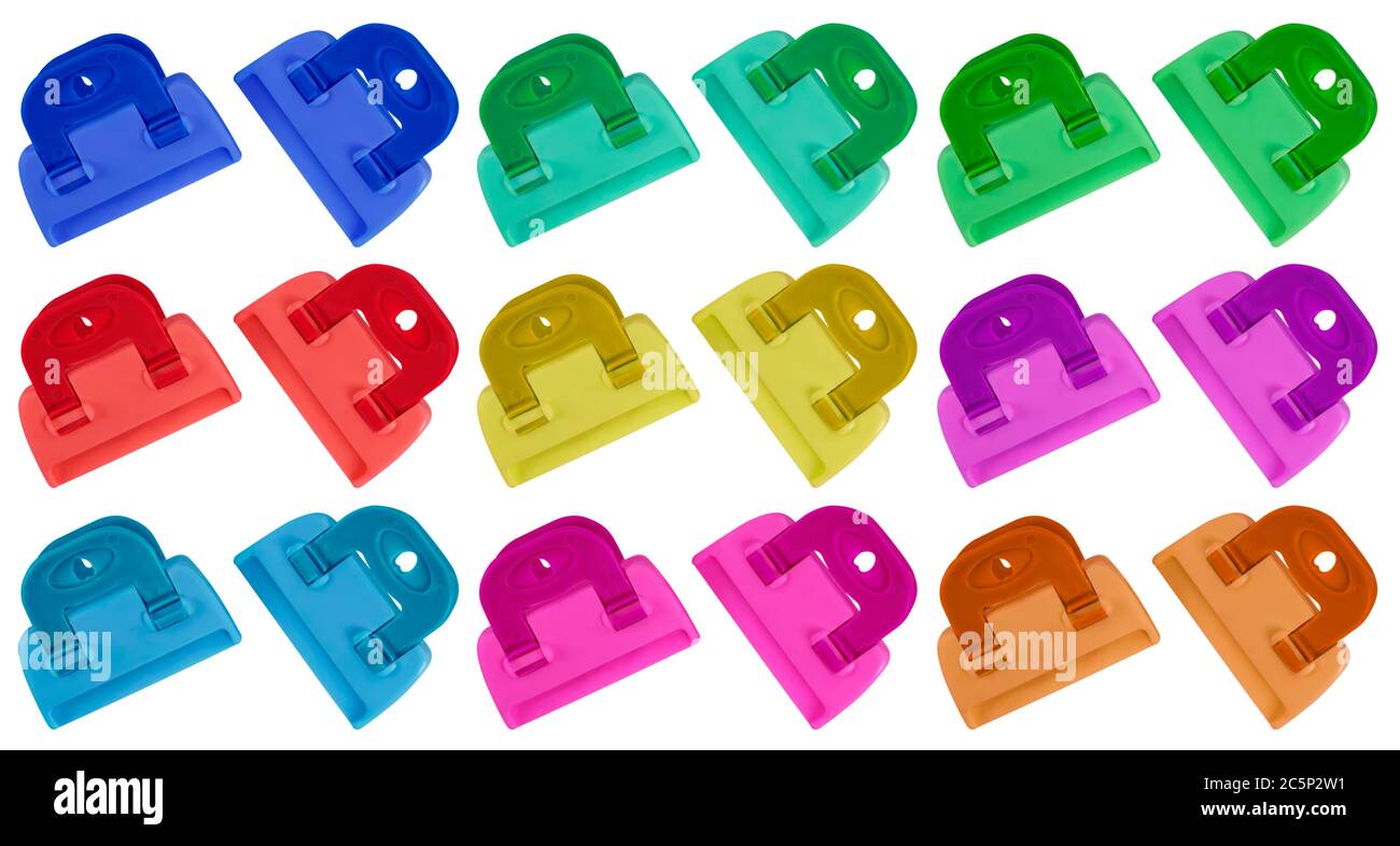 Colorful plastic clamps isolated on white background Stock Photo - Alamy