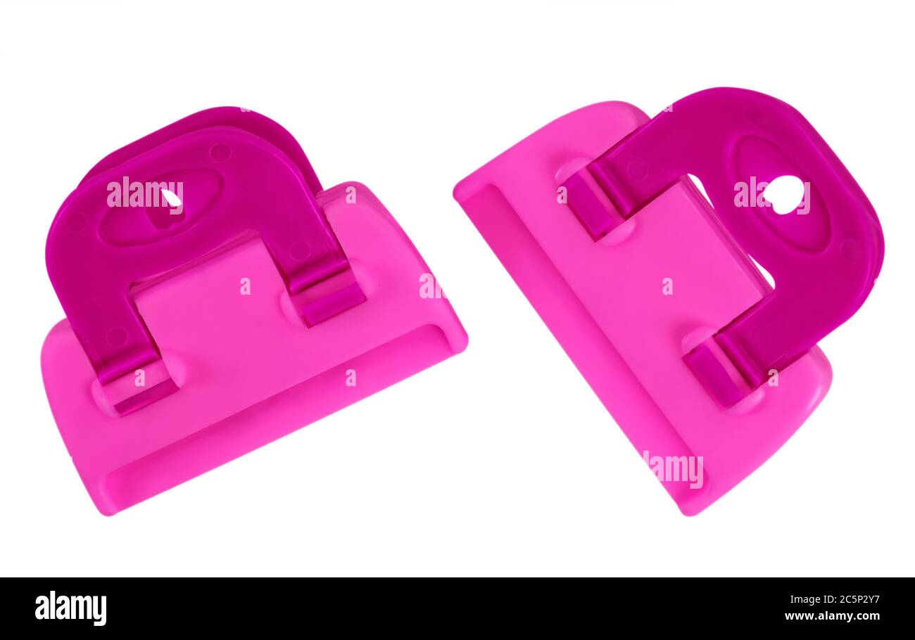 Pink plastic clamps isolated on white background. Clipping path ...