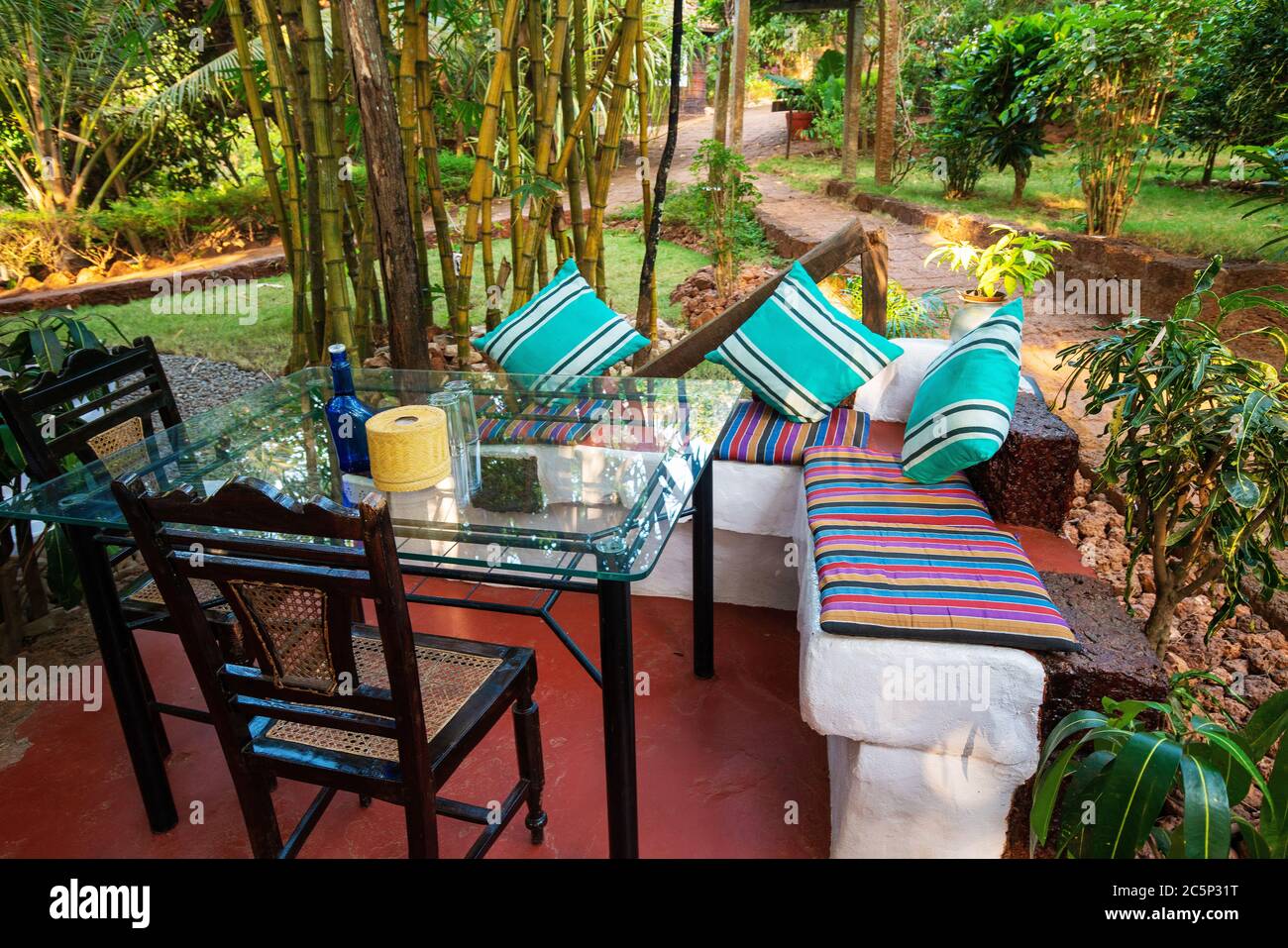 Typical cafe in India outdoors with traditional chairs and table (glass ...