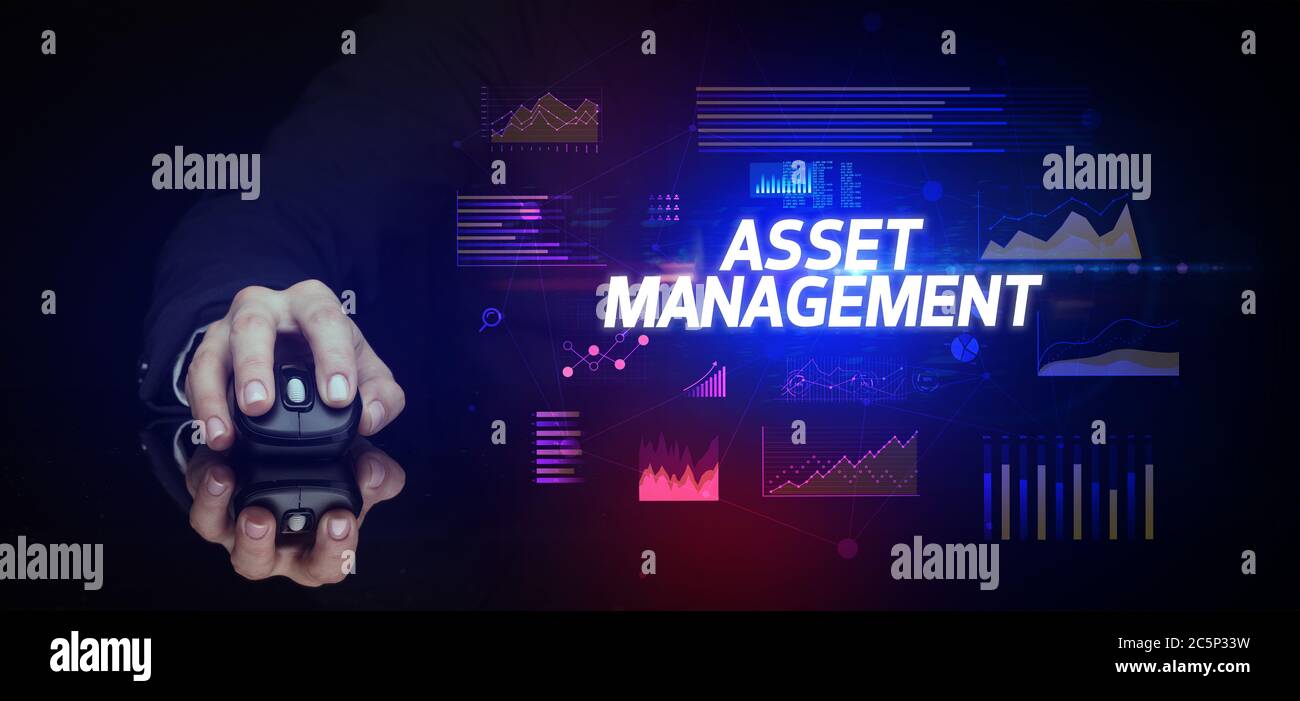 hand holding wireless peripheral with ASSET MANAGEMENT inscription ...