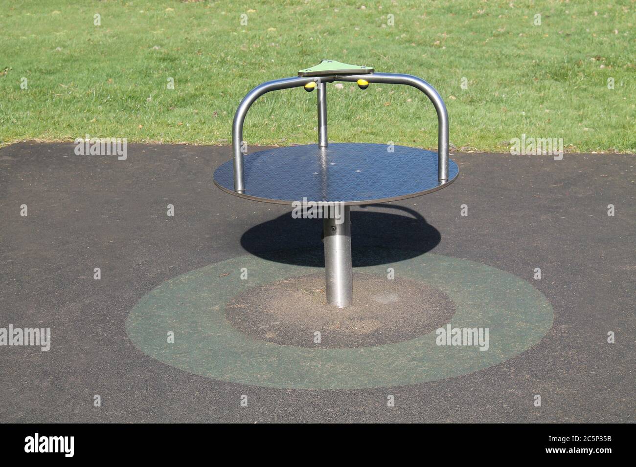 A Miniature Roundabout in an Outdoor Playground Area Stock Photo - Alamy