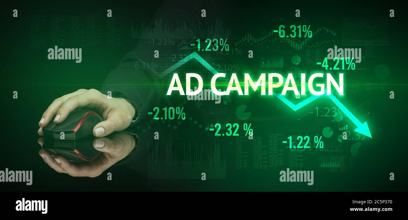 male hand holding wireless peripheral with AD CAMPAIGN inscription ...