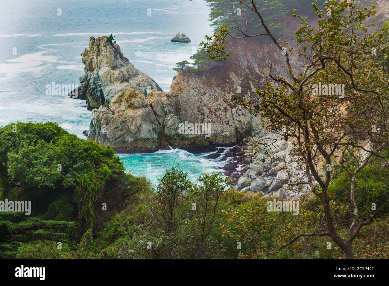 Rocks and sand in world famous Big Sur State park coast. Central ...