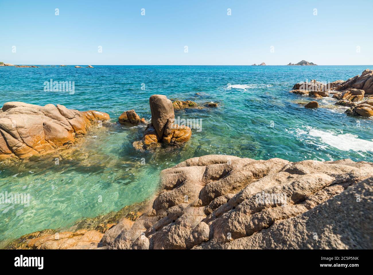 Rocks and sand in Santa Maria Navarrese beach Stock Photo - Alamy
