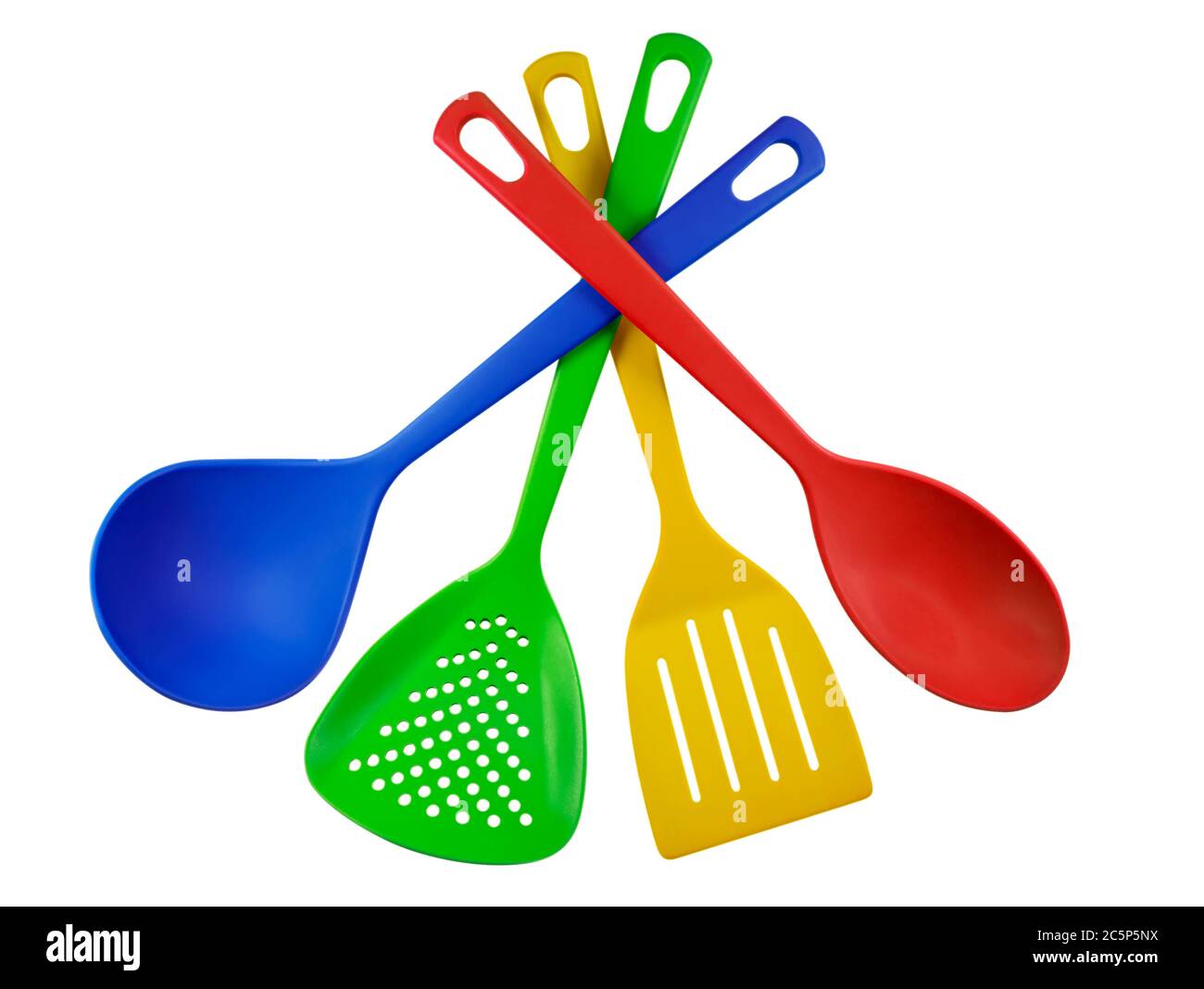 Colorful plastic kitchen utensils isolated on white. Clipping path ...