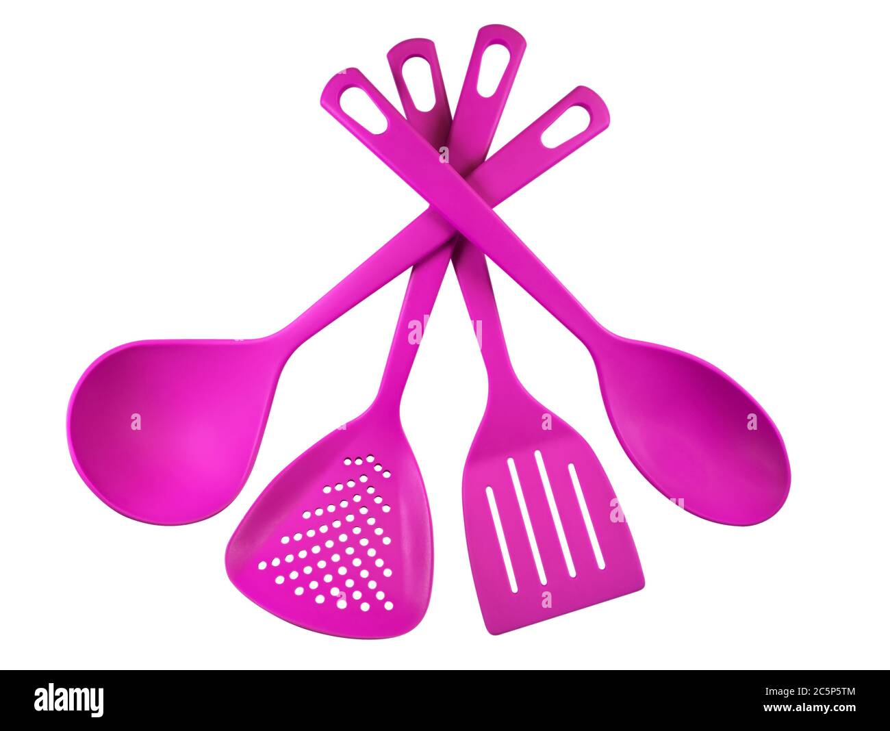 Pink plastic kitchen utensils isolated on white. Clipping path included ...