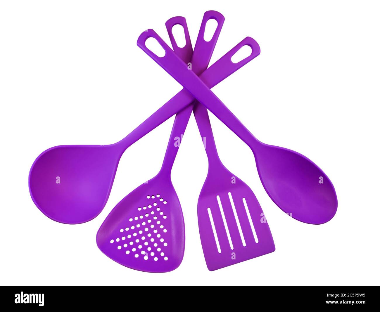 Violet plastic kitchen utensils isolated on white. Clipping path ...