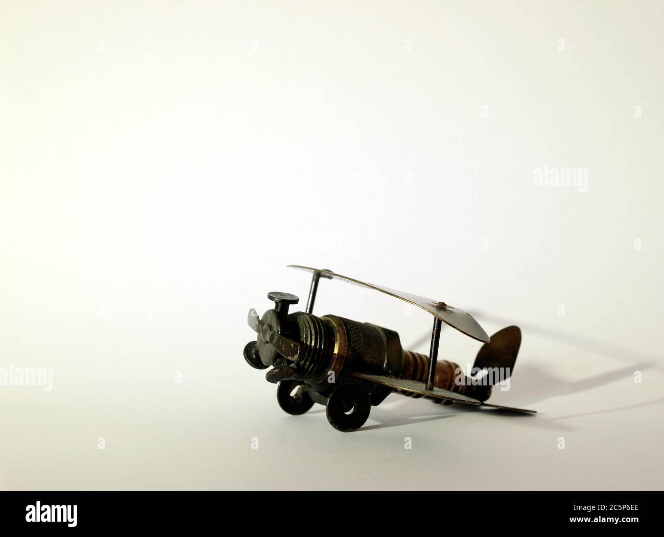 Spark plug sculpture of a plane Stock Photo - Alamy