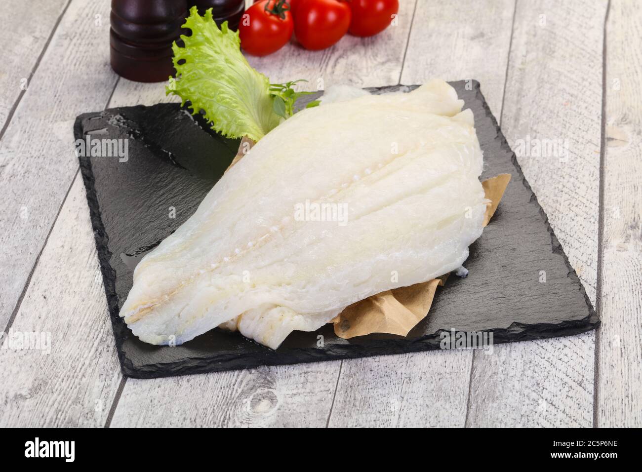 Raw halibut fillet ready for cooking Stock Photo - Alamy