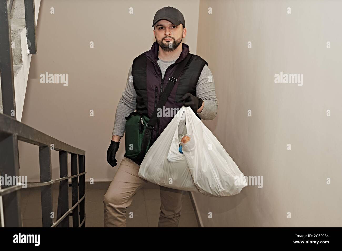 The courier delivers the goods. Delivery in boxes and packages Stock ...