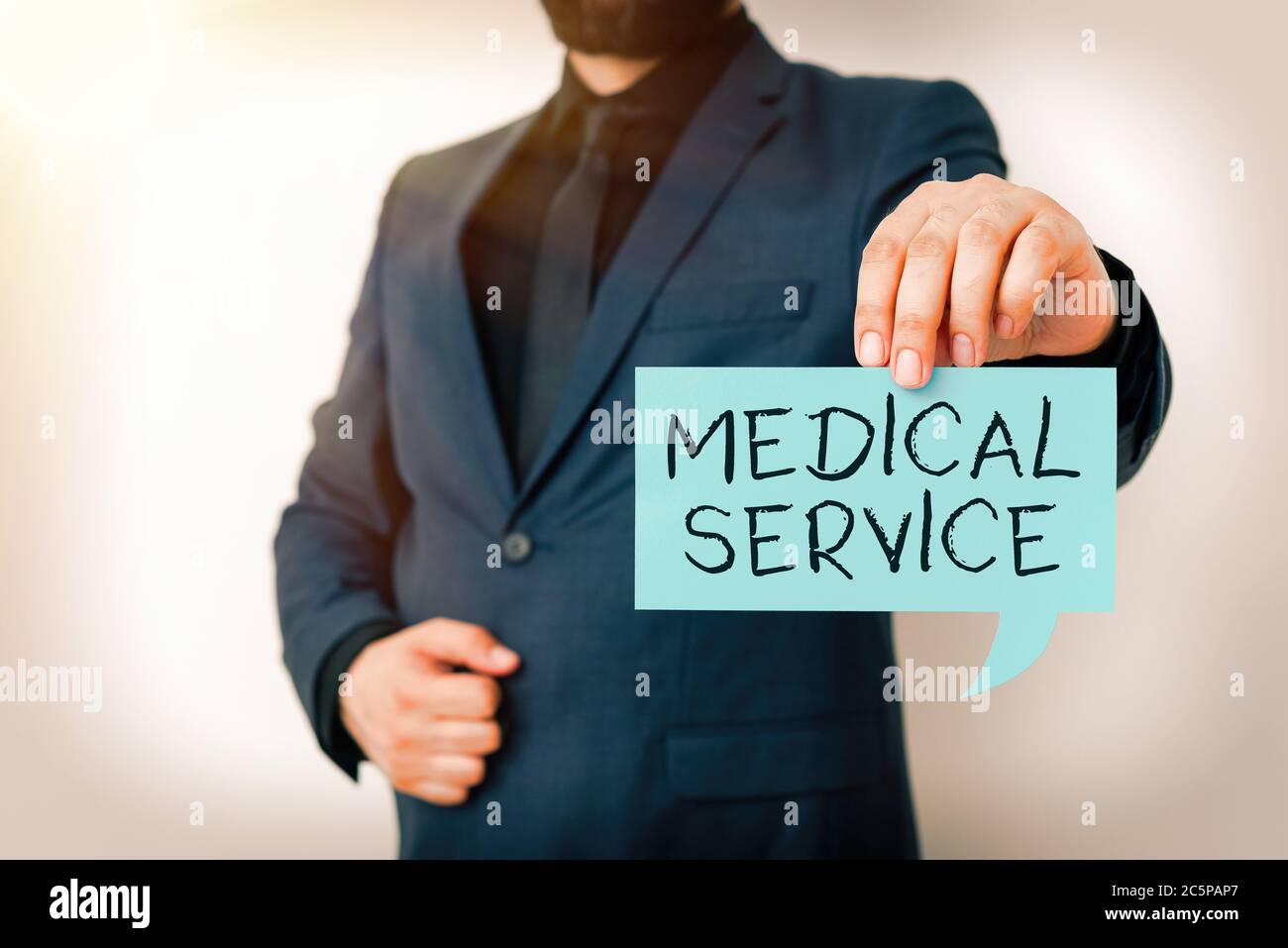 Writing note showing Medical Service. Business concept for care and ...