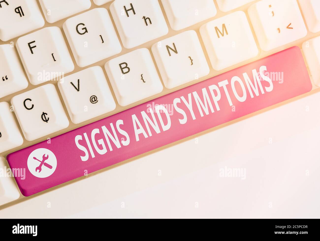 Writing note showing Signs And Symptoms. Business concept for ...