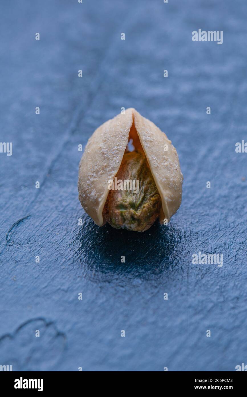 Single pistachio nut with its shell open hi-res stock photography and ...