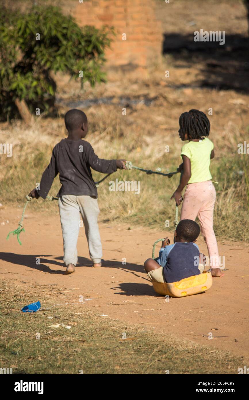 Kids Pulling Rope High Resolution Stock Photography and Images - Alamy