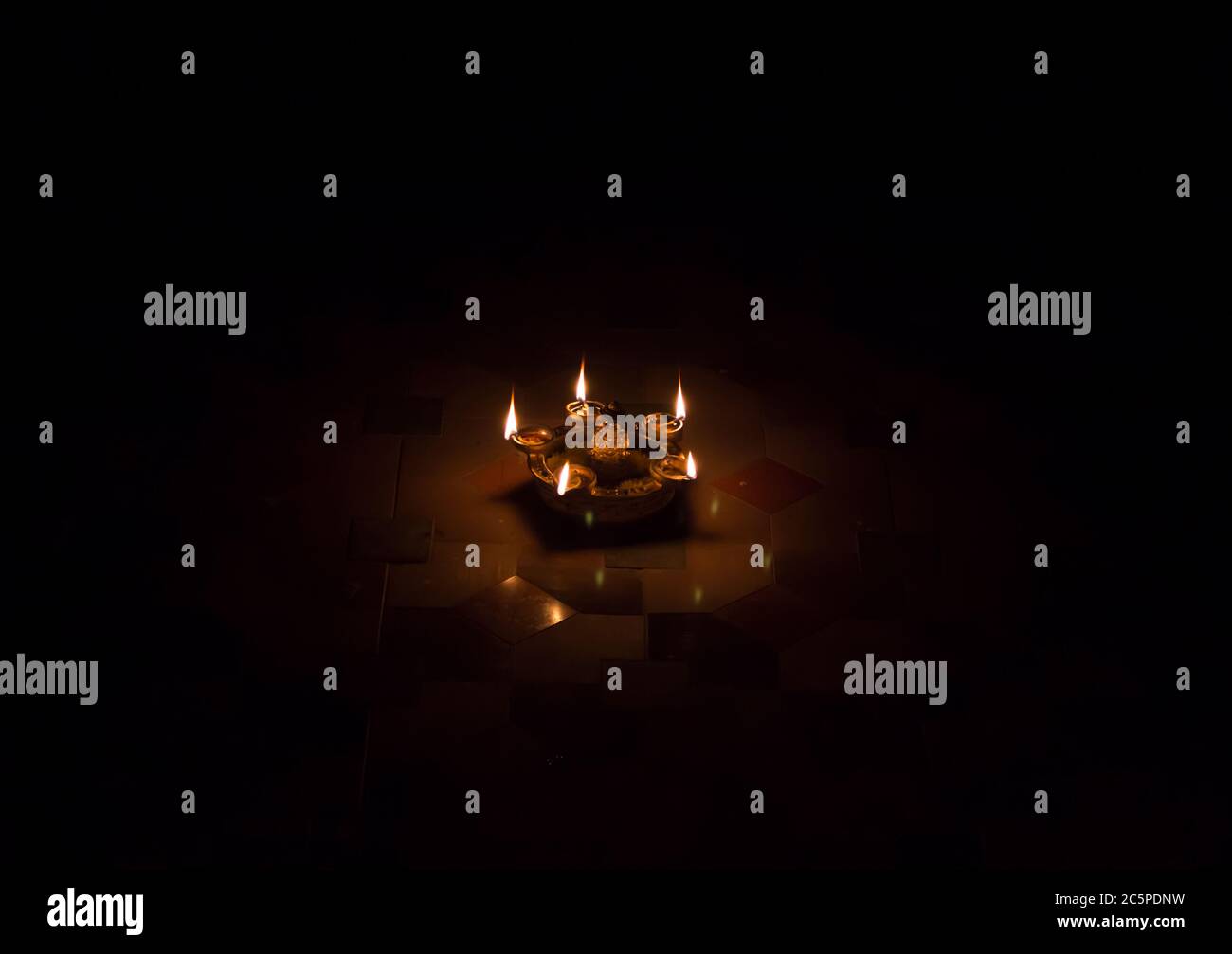 Lamp light flames at night Stock Photo - Alamy