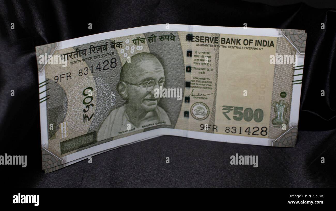 Indian 500 Rupees notes on black background Stock Photo - Alamy