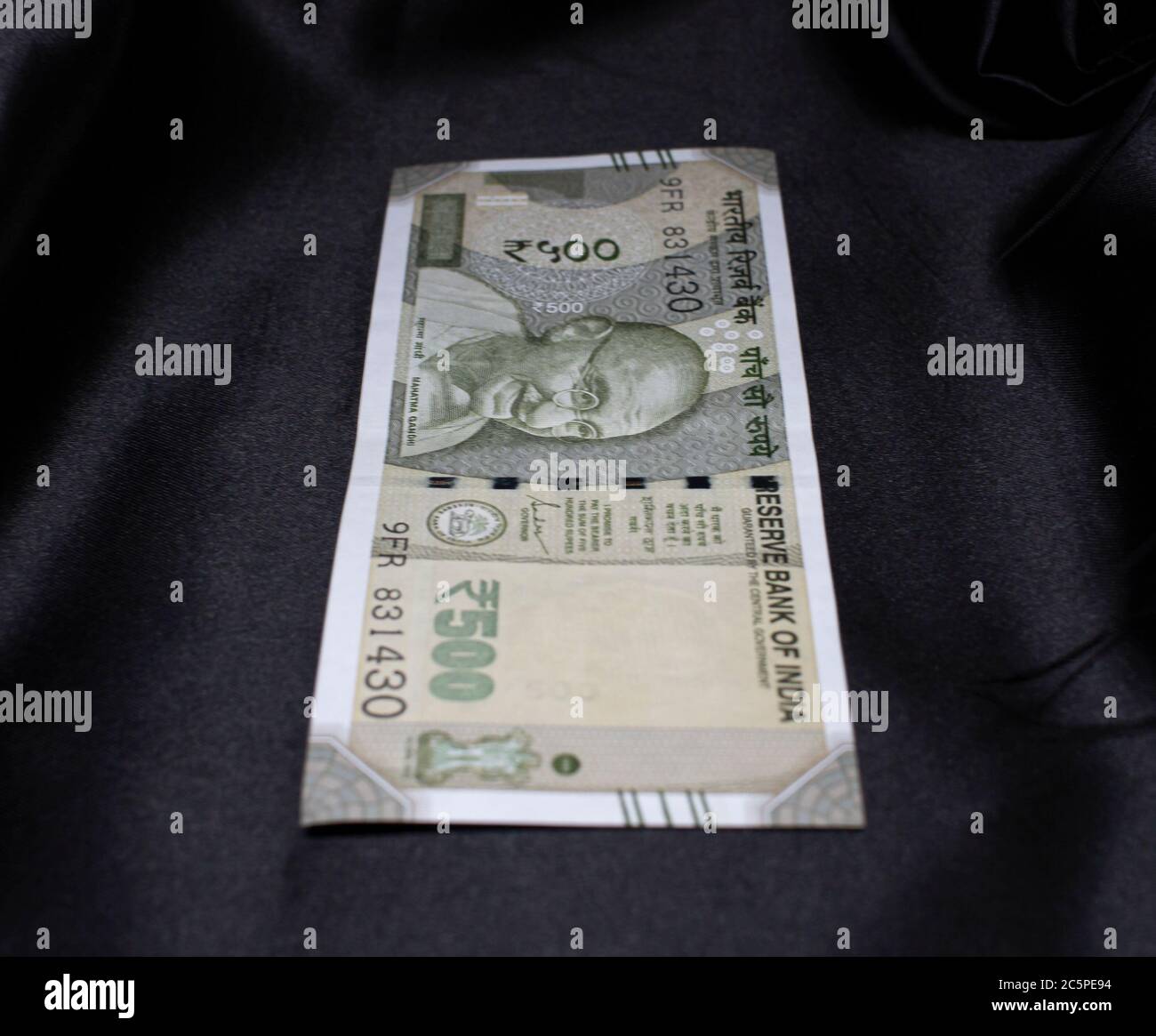 Single Indian 500 Rupees notes on black background - front view Stock ...