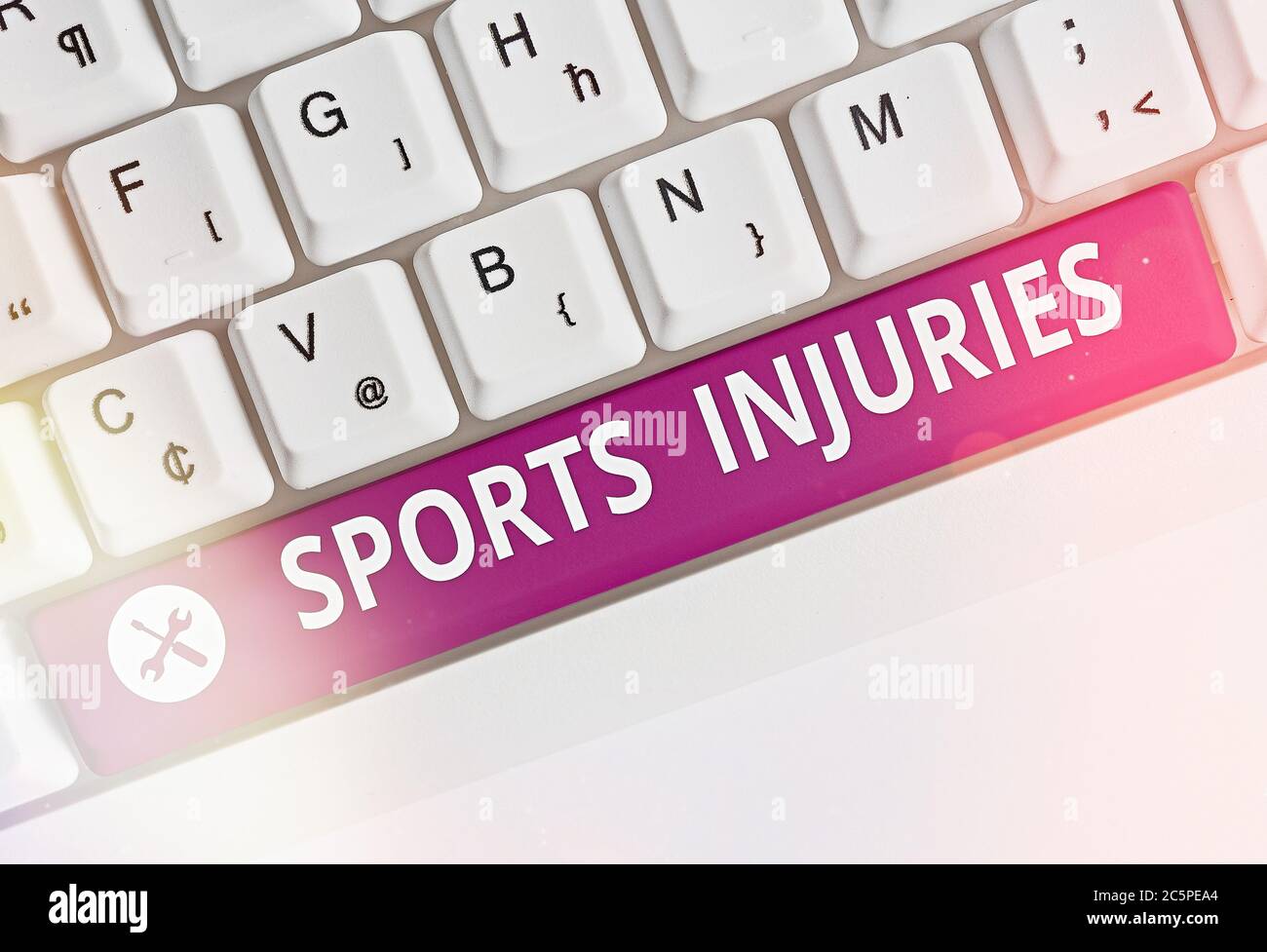 Writing note showing Sports Injuries. Business concept for injuries ...