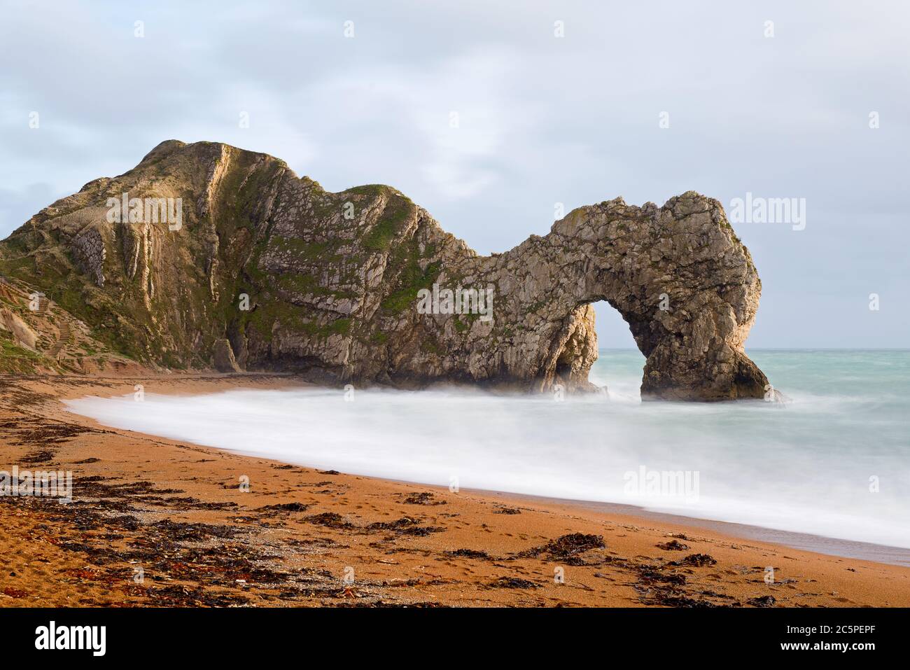 The distinctive limestone arch at Durdle Door in Dorset on the Jurassic ...