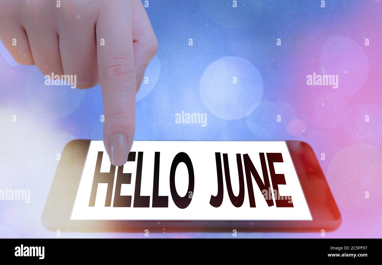 Writing note showing Hello June. Business concept for a new month to ...