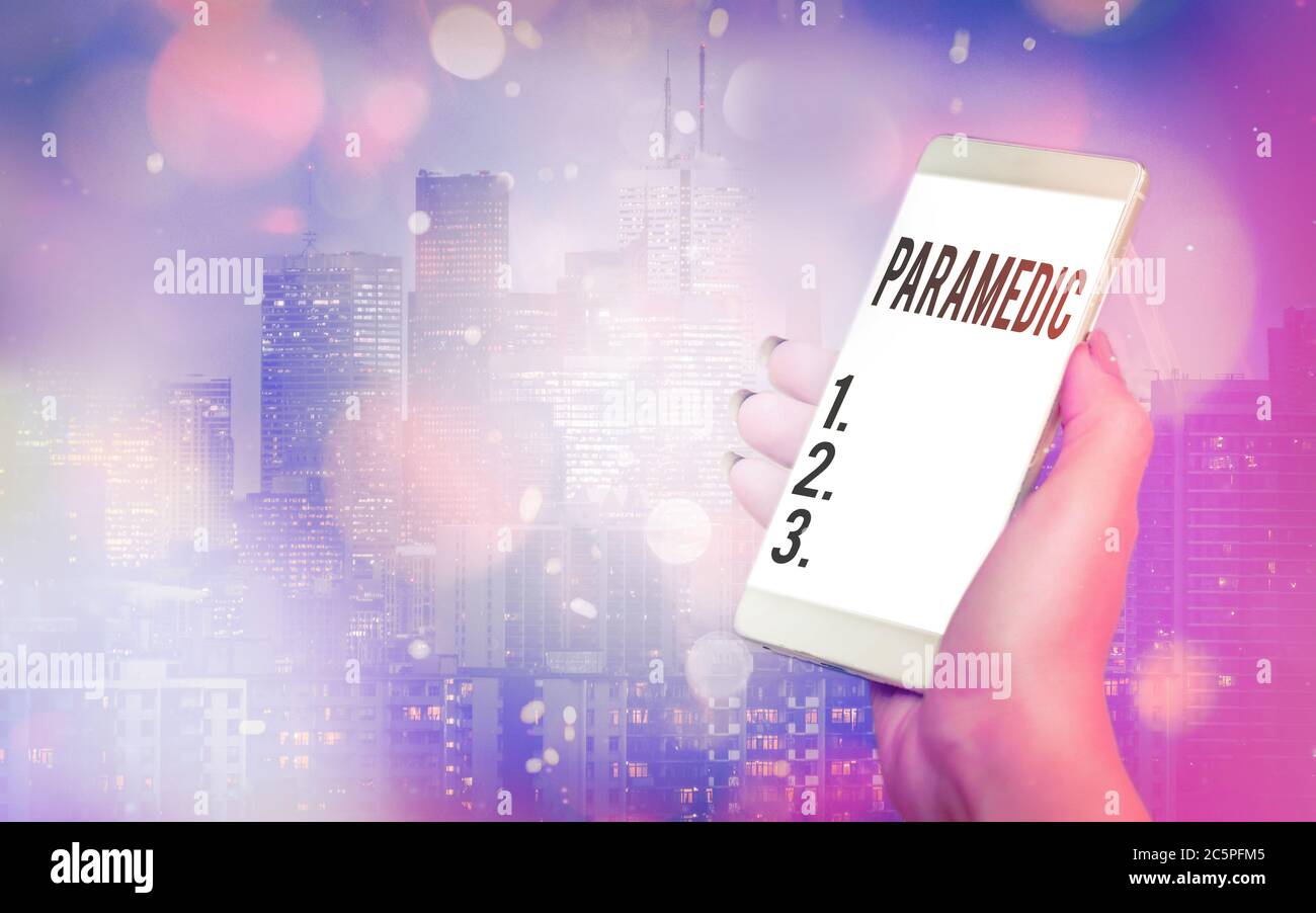 Writing note showing Paramedic. Business concept for a health worker ...